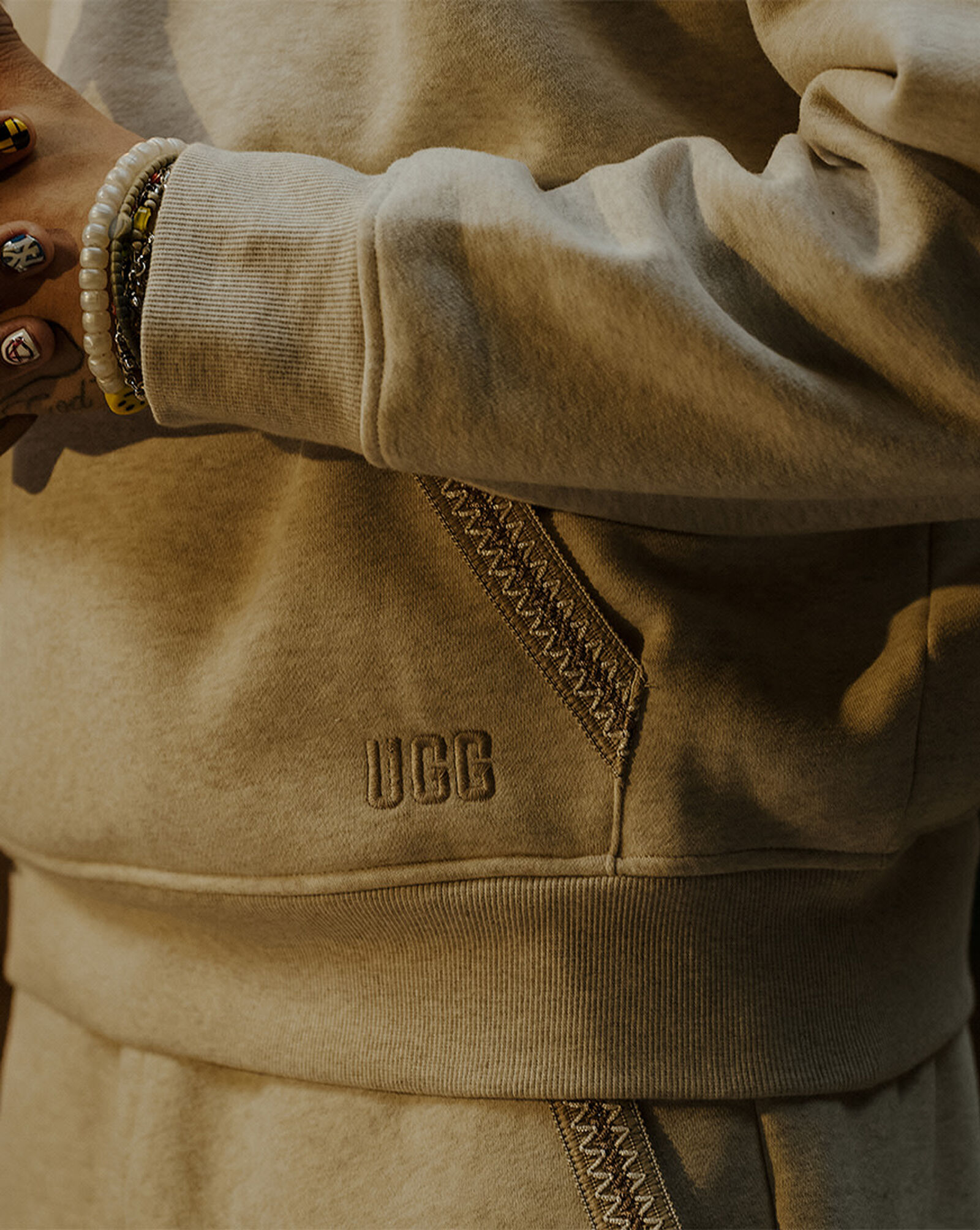 Shop UGG Tasman Pullover Hoodie 1147090-CBHH beige | SNIPES USA