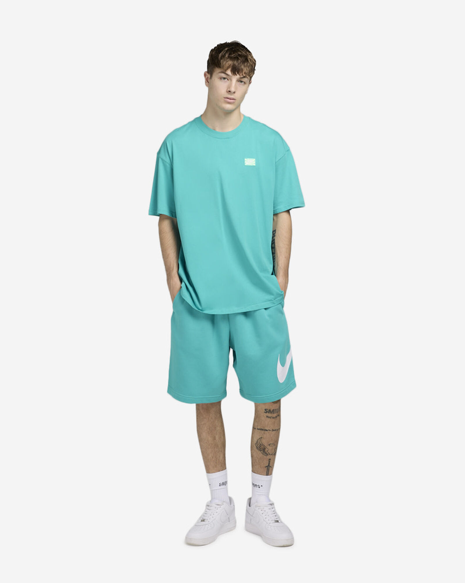 Shop Nike NSW Club Graphic Shorts BV2721-345 green | SNIPES USA